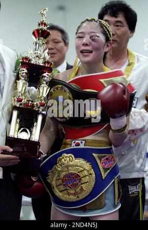 South Korea's Kim Ju-hee, left, and American Melissa Shaffer, right ...