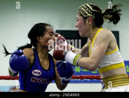 South Korea's Kim Ju-hee, left, and American Melissa Shaffer, right ...
