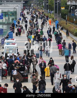 Travellers arrive at Lo Wu Control Point in Shenzhen, and ready to ...