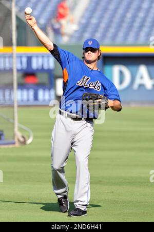 New York Mets' Lucas Duda, center, dives for first base to field a ...