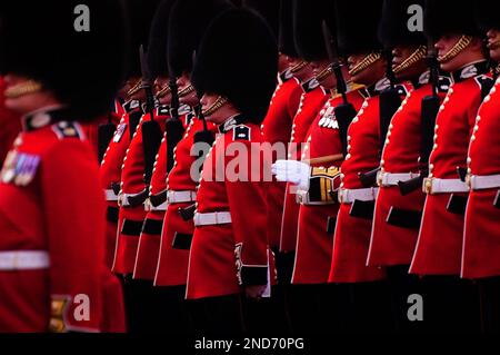Members of F Company Scots Guards prepare for inspection by Major ...