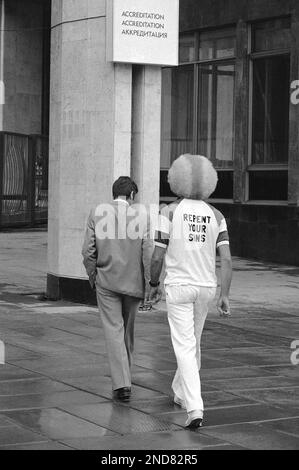 Rollen Stewart, an American with multicolored hair sporting a T-shirt ...