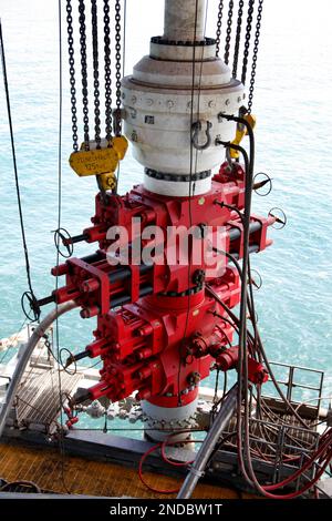An offshore oil rig on the surface of icy water in the ocean Stock ...