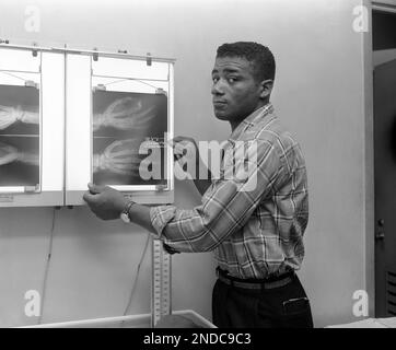 Light heavyweight boxer Archie Moore is shown in an action pose in 1955 ...