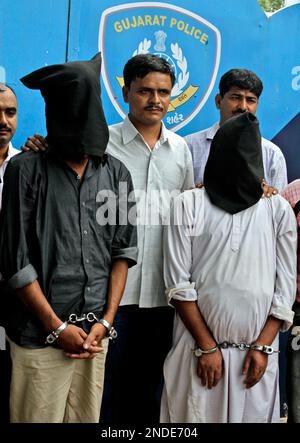 Students Islamic Movement of India (SIMI) chief Safdar Nagori, center ...