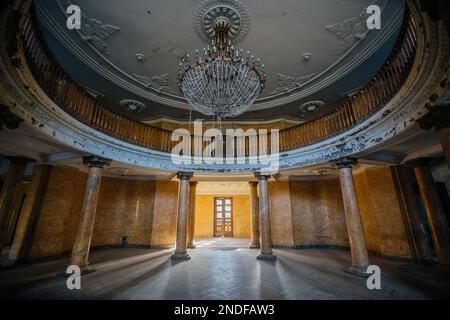Entrance round hall with chandelier at the abandoned palace Stock Photo ...