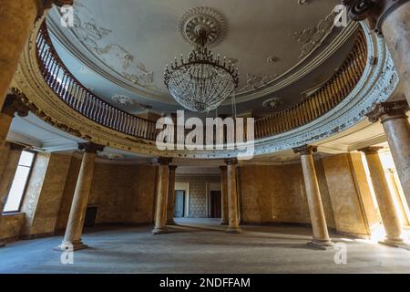 Entrance round hall with chandelier at the abandoned palace Stock Photo ...
