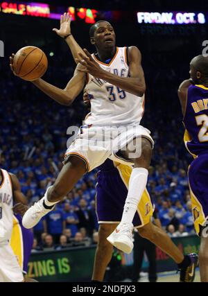 Los Angeles Lakers rookie forward Mario Bennett, left, grabs the hand ...