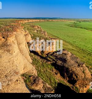 sandstone outcrop known as the big wall extending across the prairie ...