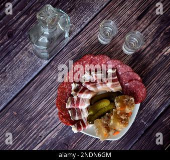 A closeup shot of a plate of sliced pickles on a white background Stock ...