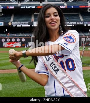 Miss USA, Rima Fakih, wearing a jersey at the Mets baseball game in ...