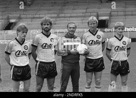 The new trainer of BV Borussia Dortmund, Pal Csernai, center, laughs ...