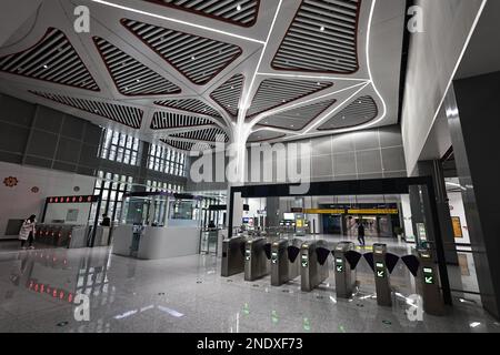 China's first metro station built on the river-crossing bridge ...