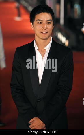 Hong Kong actor Daniel Wu, right, and Taiwanese actress Shu Qi, center ...