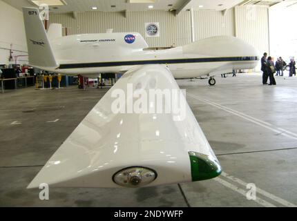 A NASA Global Hawk robotic jet sits in a hangar at Dryden Flight ...