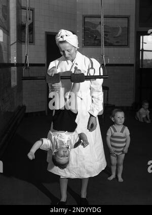 Rickets, curvature of the spine and other physical defects in children ...