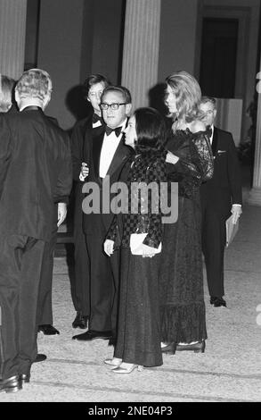 Nancy Maginnes, companion of Henry Kissinger glances at the ...