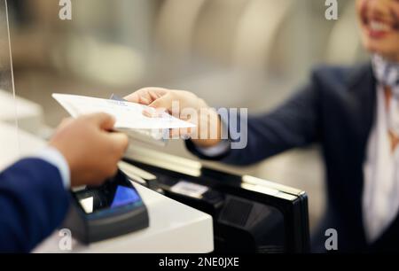 Hands, airport and service agent with ticket, passport or documents to ...