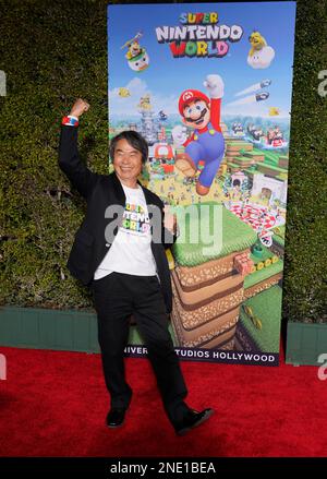 Shigeru Miyamoto poses at the Super Nintendo World grand opening press ...