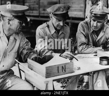 Major General Nathan F. Twining Studies A Mosaic At A 90Th Photo Reconn ...