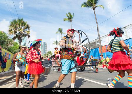 Circus performers dance, sing and play percussion instruments during ...