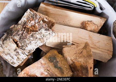 Pile of logs with Axe for the woodburner or open fire at home Stock ...