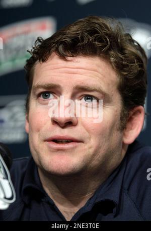 Seattle Seahawks general manager John Schneider watches as players warm ...