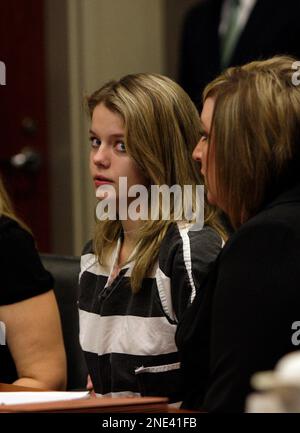 Elizabeth Johnson, left, mother of missing baby Gabriel, reacts to ...