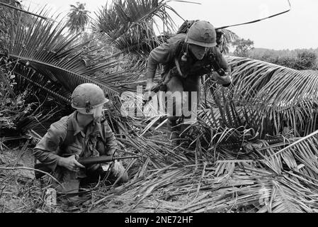Vietnam: 1967 A U.S. Air Force C-130 Hercules climbs sharply as it ...