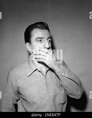 San Quentin death row author Caryl Chessman held cigarette as he faced ...