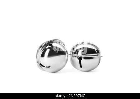 Shiny silver sleigh bells on white background Stock Photo - Alamy