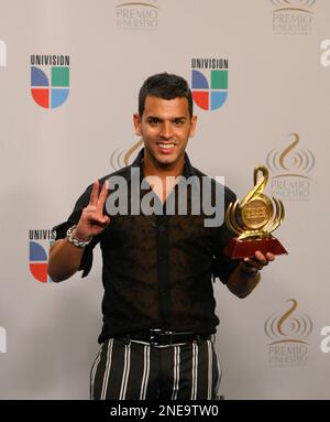 Reggaeton singer Tito El Bambino, of Puerto Rico, poses for ...