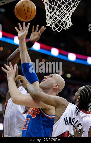 Cleveland Cavaliers' Zydrunas Ilgauskas, of Lithuania, sits on the ...