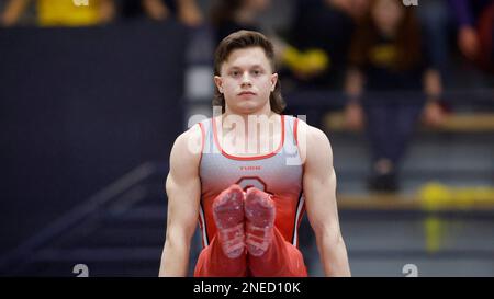 Ohio State's Caden Spencer competes in the high bar during an NCAA ...