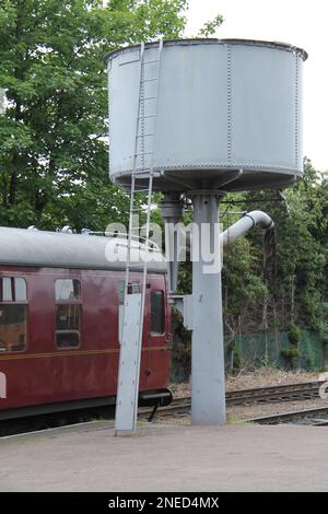 Water tank to fill steam train up Stock Photo - Alamy