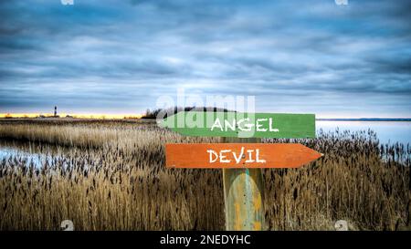 Street Sign the Direction Way to Angel versus Devil Stock Photo - Alamy