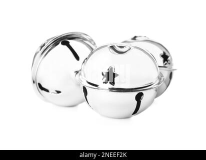 Shiny silver sleigh bells on white background Stock Photo - Alamy