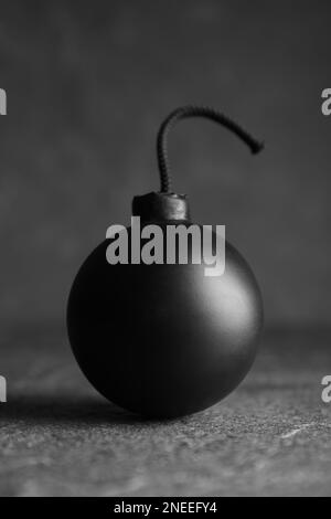 Old fashioned fuse bomb on grey table. Space for text Stock Photo - Alamy