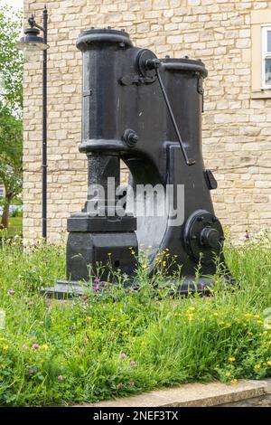 An industrial black Air Hammer used as part of the forging process ...