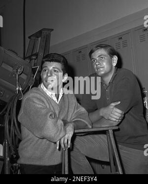 ELEANOR POWELL, PETER FORD and GLENN FORD pose for a photo outside ...