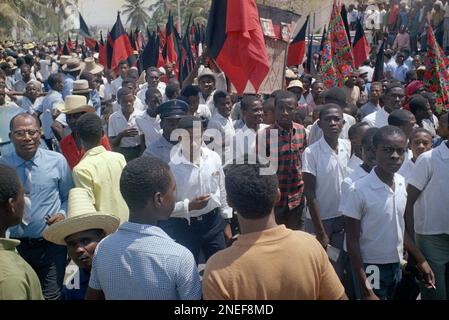 Tonton Maconte marching in downtown Port au Prince in support of PA PA ...