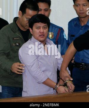 Andal Ampatuan Jr., center, the prime suspect in the massacre of 57 ...