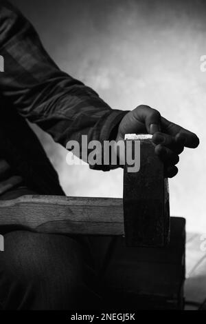 Maniac with sharp axe. Scary atmosphere Stock Photo - Alamy
