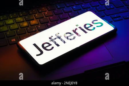 In this photo illustration the Jefferies Group logo seen displayed on a ...