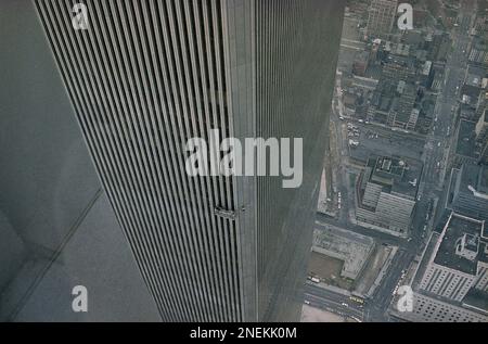Daniel Goodwin (?Spider Man?) climbs the sheer face of the North Tower ...