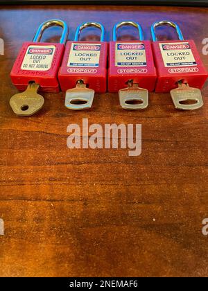 Red Lock out tag out locks locks . High quality photo Stock Photo - Alamy
