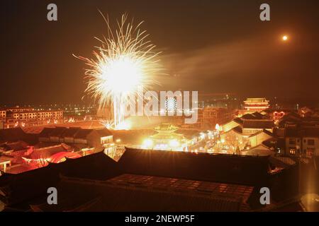 Fireworks up ancient buildings at night, in China Stock Photo - Alamy