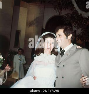 Tony Curtis and his bride, model Leslie Allen, pose at the Curtis home ...