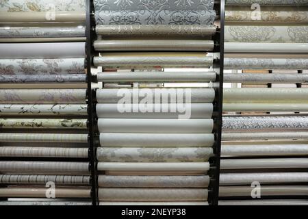 Assortment of stylish wall papers on display in shop Stock Photo - Alamy