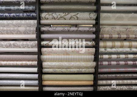 Assortment of stylish wall papers on display in shop Stock Photo - Alamy